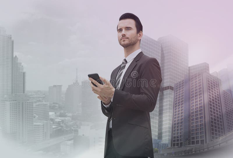 Double Exposure of a Businessman and City Using Mobile Phone. Stock ...