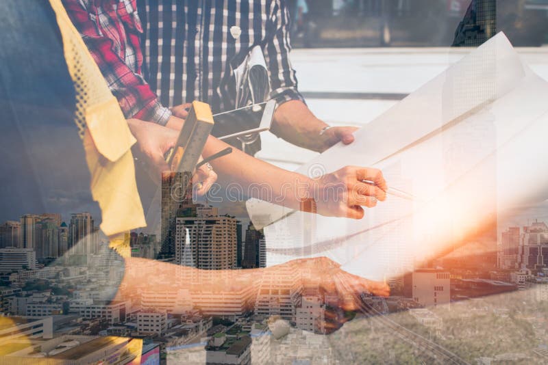 Double Exposure of Hand Engineer with Modern City Background.meeting ...