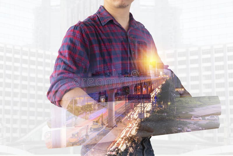 The Double Exposure Image of the Engineer Standing Back during Sunrise ...