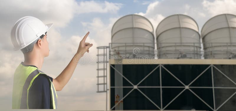 Double Exposure Image of Mechanical Engineer with Cooling Tower on ...