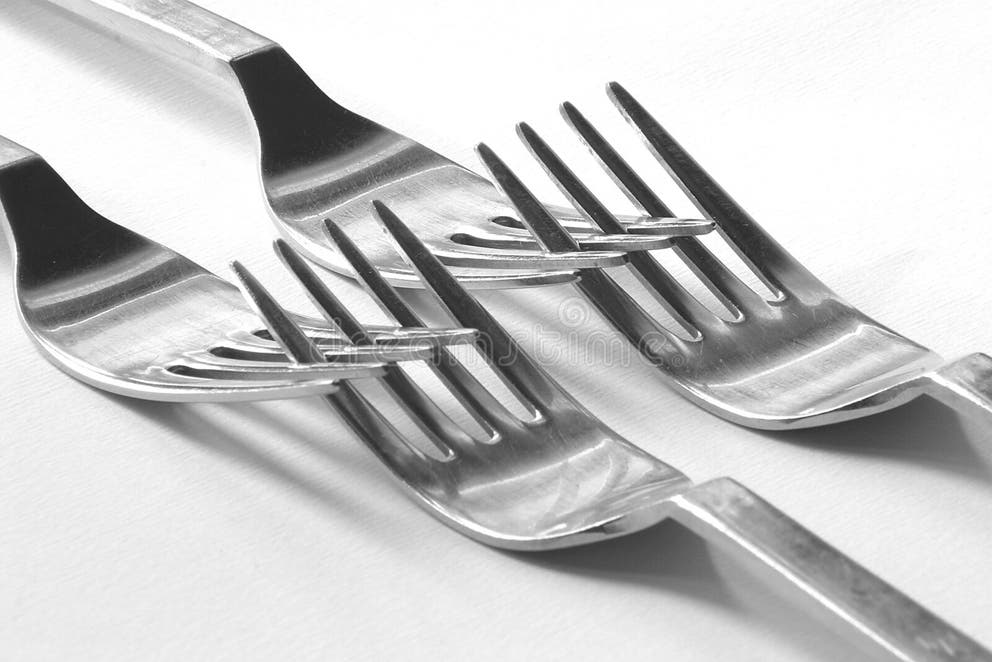 Double forks embrace stock image. Image of table, supper - 47409