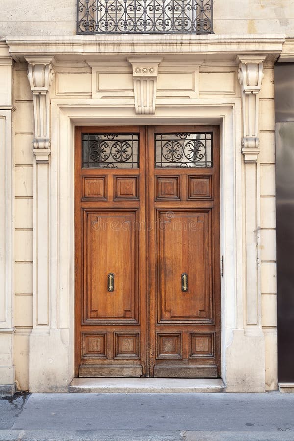 Double Front Door with Decorated Archway Stock Image - Image of wood ...