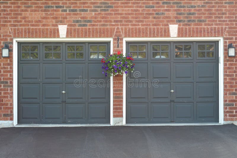 Double Garage with a Flower Pot Stock Image - Image of garage, door ...
