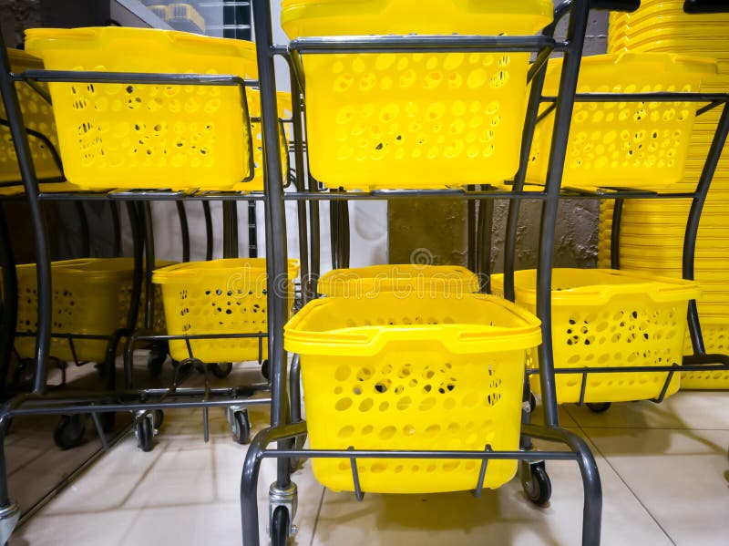 Double Layer of Yellow Shopping Cart in Shopping Mall Stock Photo ...