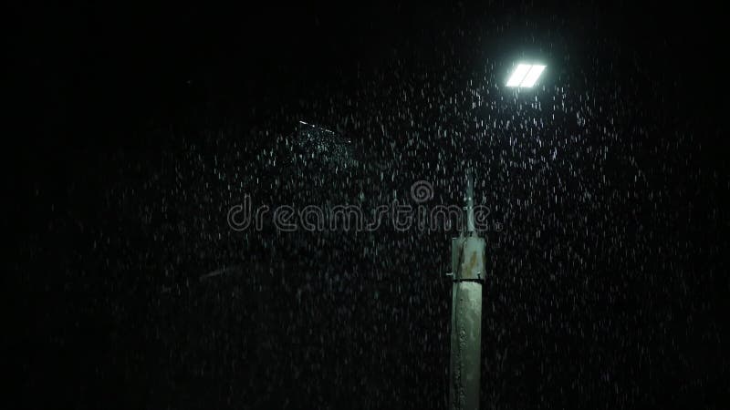 Double Led Panel Lamppost Under Heavy Rain at Night. Midsize View of ...