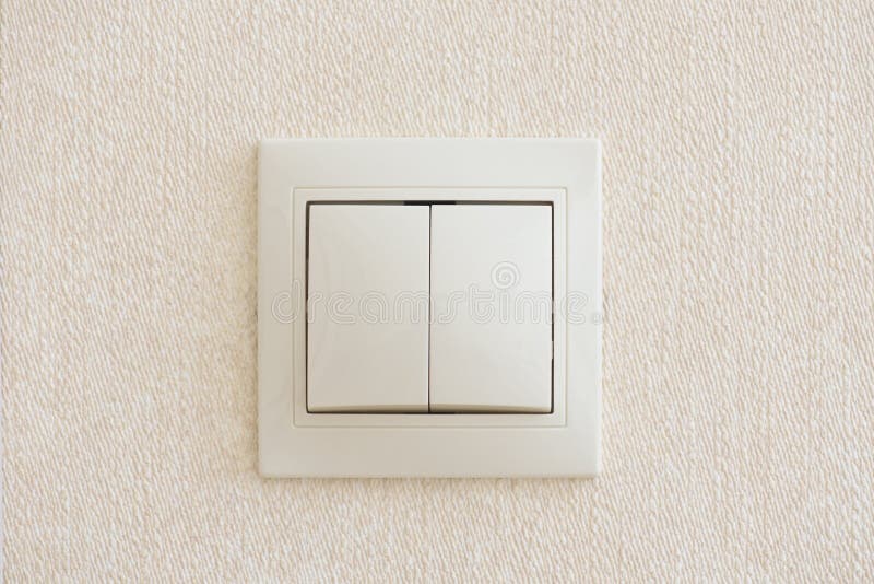Double Light Switch in Beige Color, Built into the Wall Stock Image ...