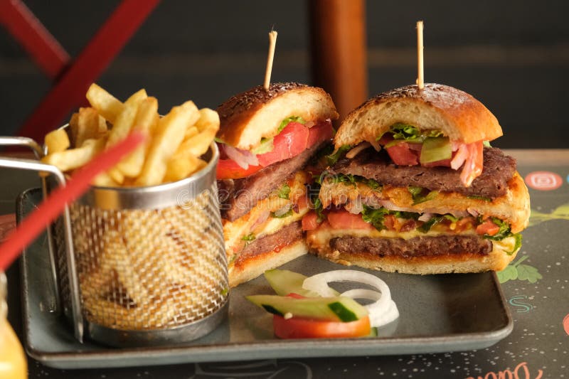 Double Meat Burger with Fried Onion Rings Stock Photo - Image of bread ...
