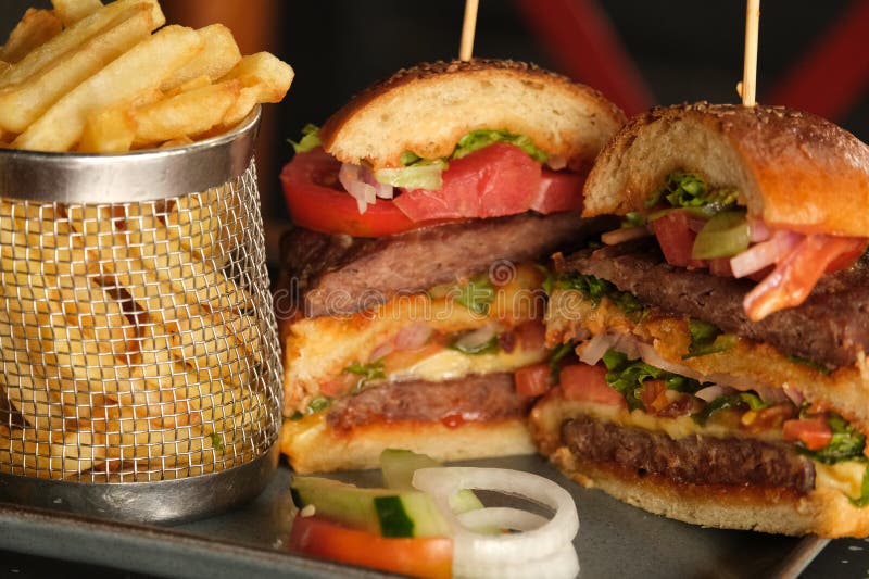 Double Meat Burger with Fried Onion Rings Stock Image - Image of ...