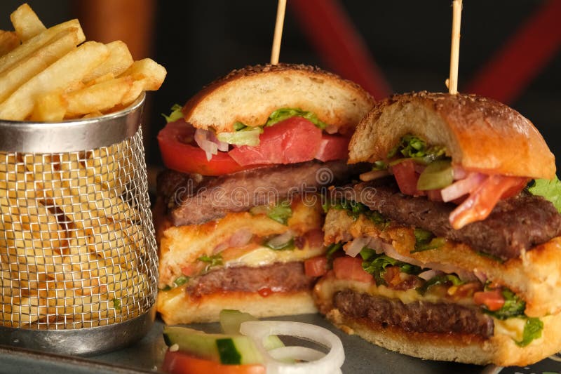 Double Meat Burger with Fried Onion Rings Stock Image - Image of cheese ...