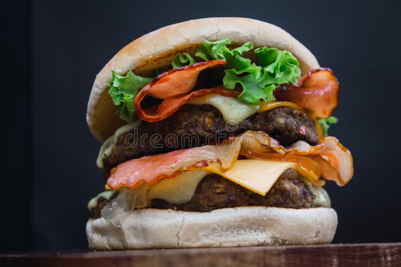 Double Meat Burger on Wooden Board Stock Photo - Image of healthy ...