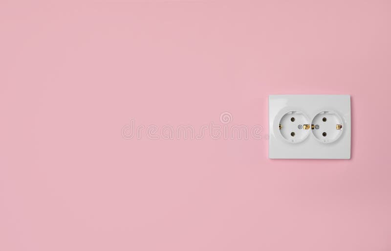 Double Power Socket on Pink Wall, Space for Text. Electrical Supply ...
