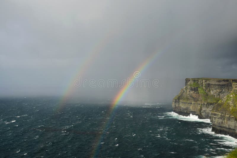 A Double Rainbow Over the Cliffs of Moher in Ireland Stock Photo ...