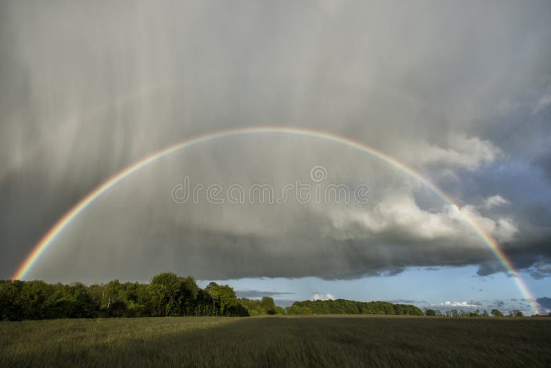 Double rainbow stock photo. Image of field, rain, light - 57016544
