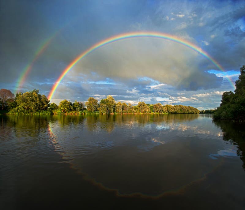 Rainbow Double Over The River Stock Photo - Image of sand, lighting ...