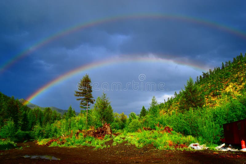 Double Rainbow stock image. Image of green, rainbow, double - 90133897