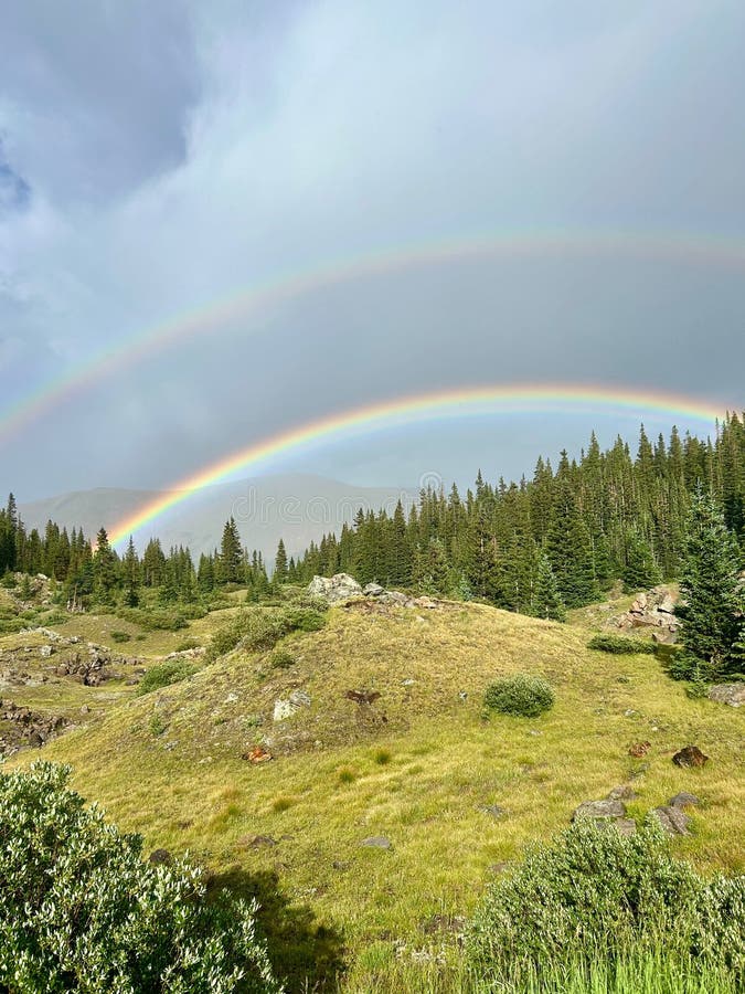 Double Rainbow after a Rainstorm in the Mountains Stock Image - Image ...