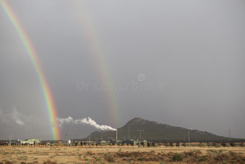 Double Rainbow Rising Over an Industrial Area Stock Photo - Image of ...