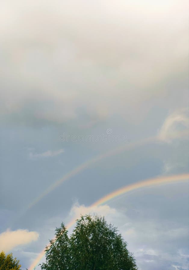 Double Rainbow in the Sky with Clouds Stock Image - Image of horizon ... Double Rainbow in the Sky with Clouds Stock Image - Image of horizon ...