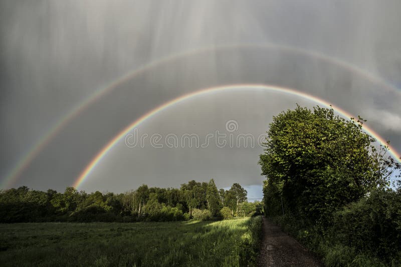 Double rainbow stock photo. Image of sunshine, weather - 57016538