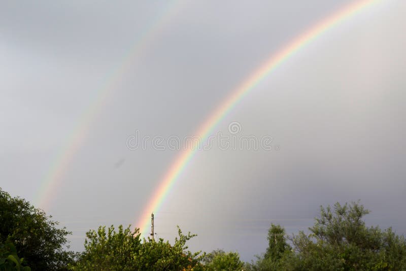 Double Rainbow after a Storm in the Village. Stock Image - Image of ...