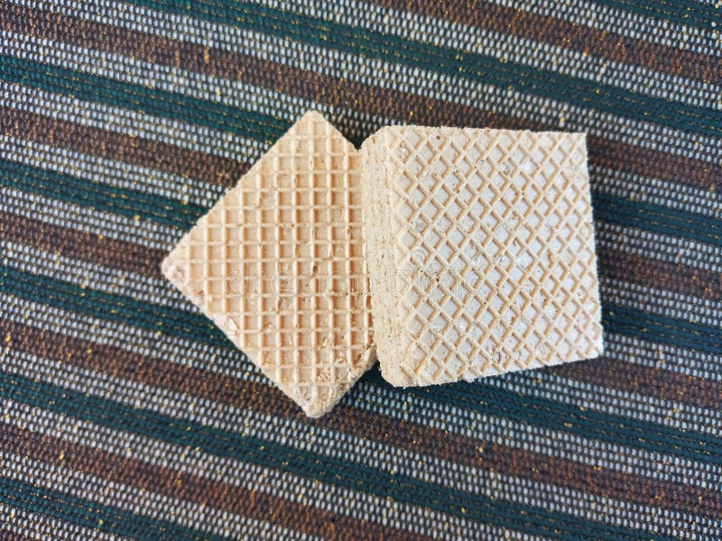 Double Square Cream Wafers on Striped Carpet Stock Image - Image of ...