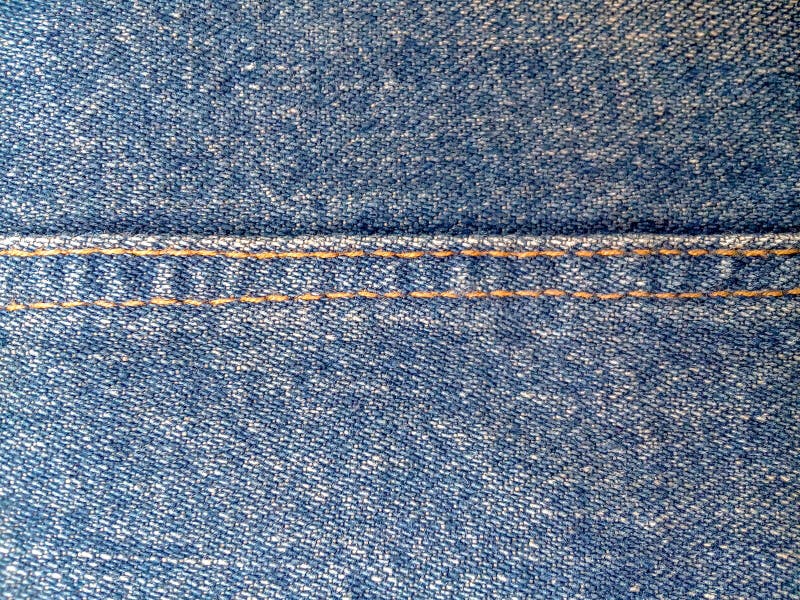 Double Stitch on Denim. Stitched with Orange Thread. Light Scuff Marks ...
