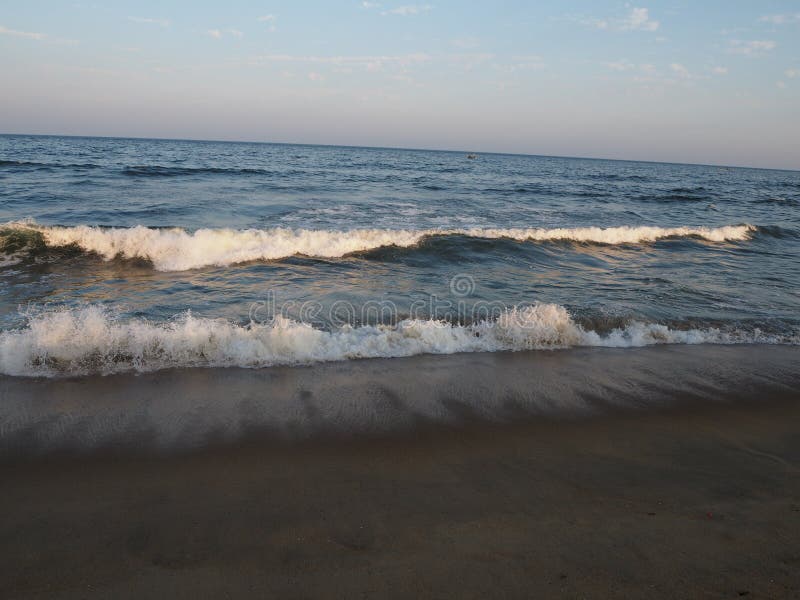 An Double Strong Waves in Beach Life Stock Image - Image of sunset ...