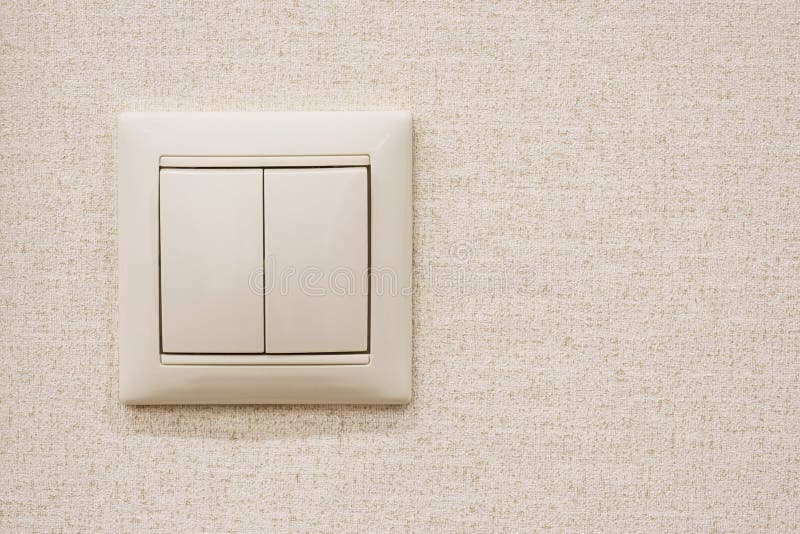 Double Switch on Beige Wall with Wallpaper, Copy Space Stock Image ...