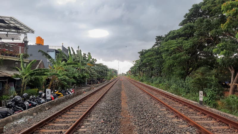 Double Track Rail Road in Suburbs Stock Photo - Image of lane, vehicle ...