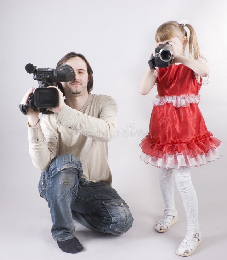 Family Recording with Video Camera Stock Photo - Image of camera, room ...