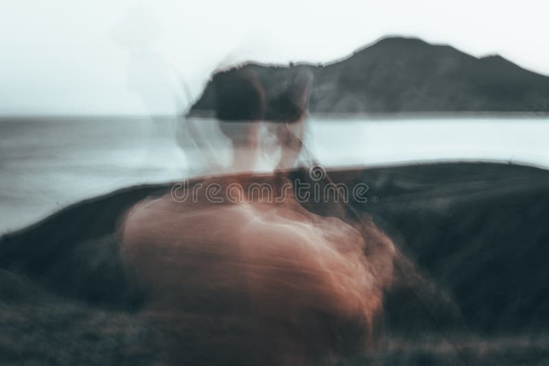 Double Vision Man at Dusk in the Mountains when Moving at a Long ...