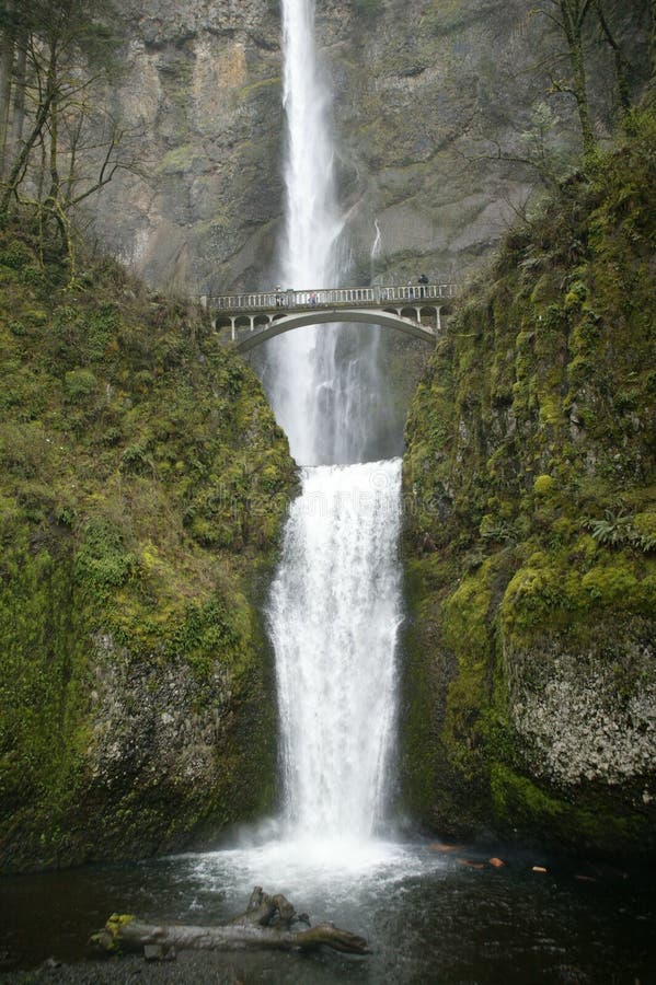 Arched Bridge Over Waterfall Stock Photo - Image of scenery, cascading ...