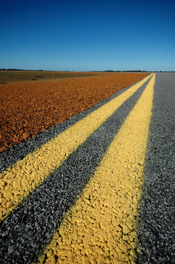 Double Yellow Parallel Lines in Concrete Road Stock Photo - Image of ...
