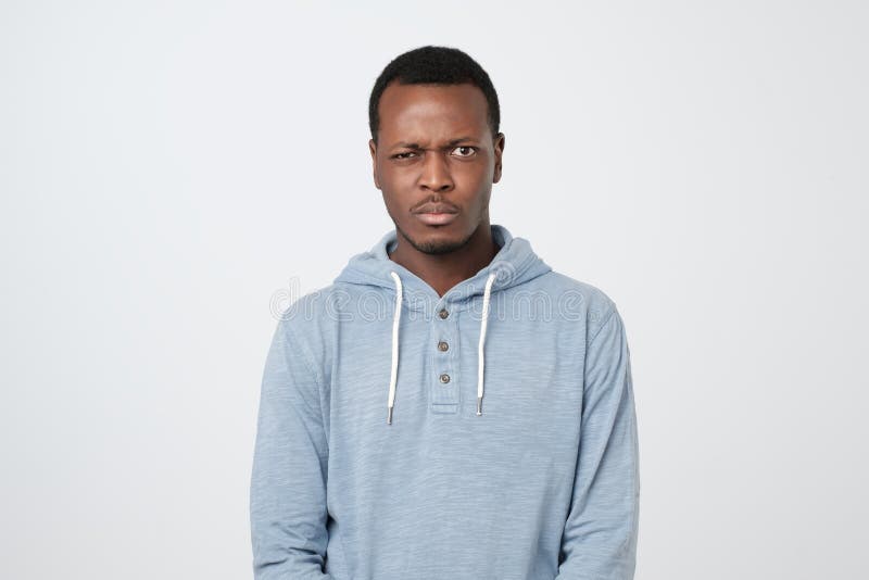 Doubtful African Man in Blue Pulover Looking with Disbelief Expression ...