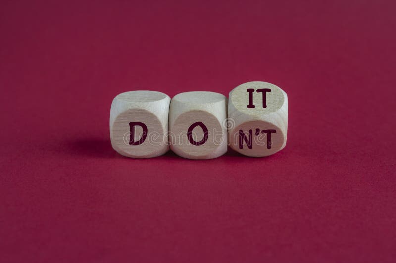 Doubt, Uncertainty. Turned a Cube with Words DO it or DON T on the ...