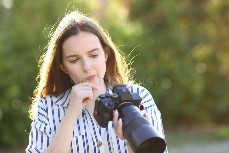 Doubtful Photographer Checking Mirrorless Camera Stock Image - Image of ...