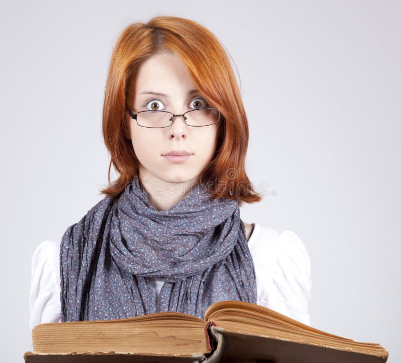 Doubting Girl In Glasses With Old Book Stock Photo - Image of doubt ...