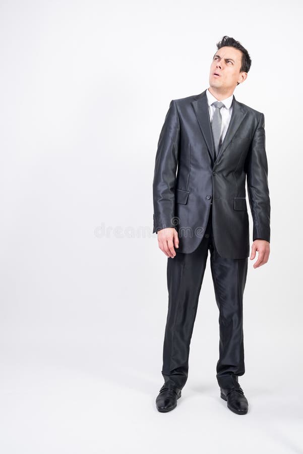 Doubting man in suit stock photo. Image of unsure, middle - 178599566