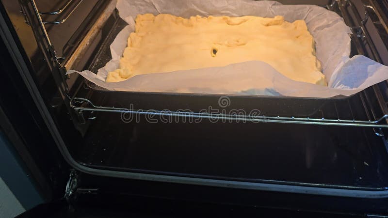 Dough on a Baking Sheet with Filling. Step-by-step Preparation of the ...