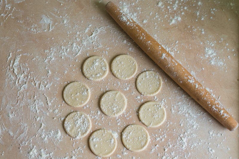 Dough Circles and Rolling Pin Stock Photo - Image of cuisine, bake ...