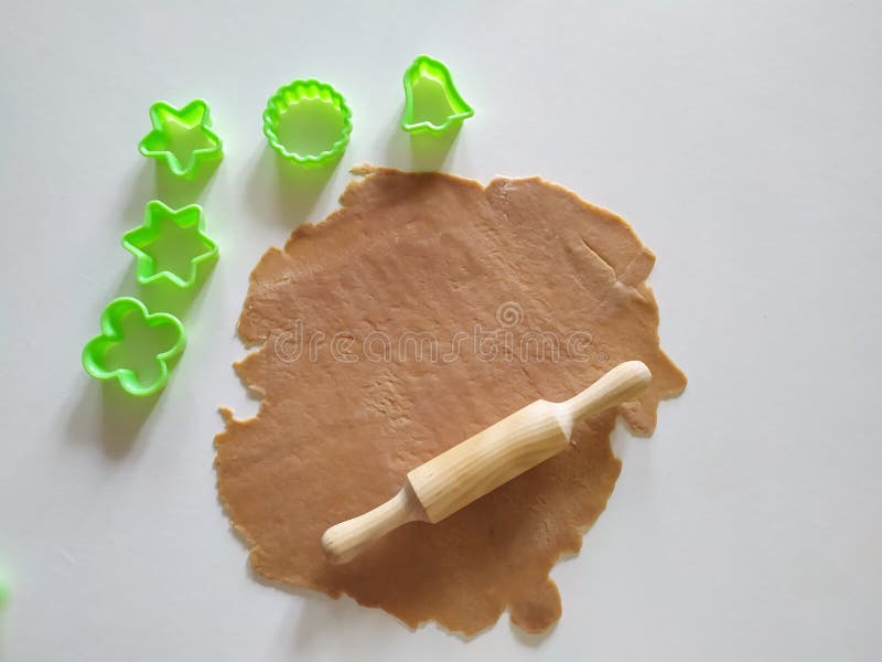 Dough and Five Cookie Molds on a White Background. Ginger Cookie Dough ...