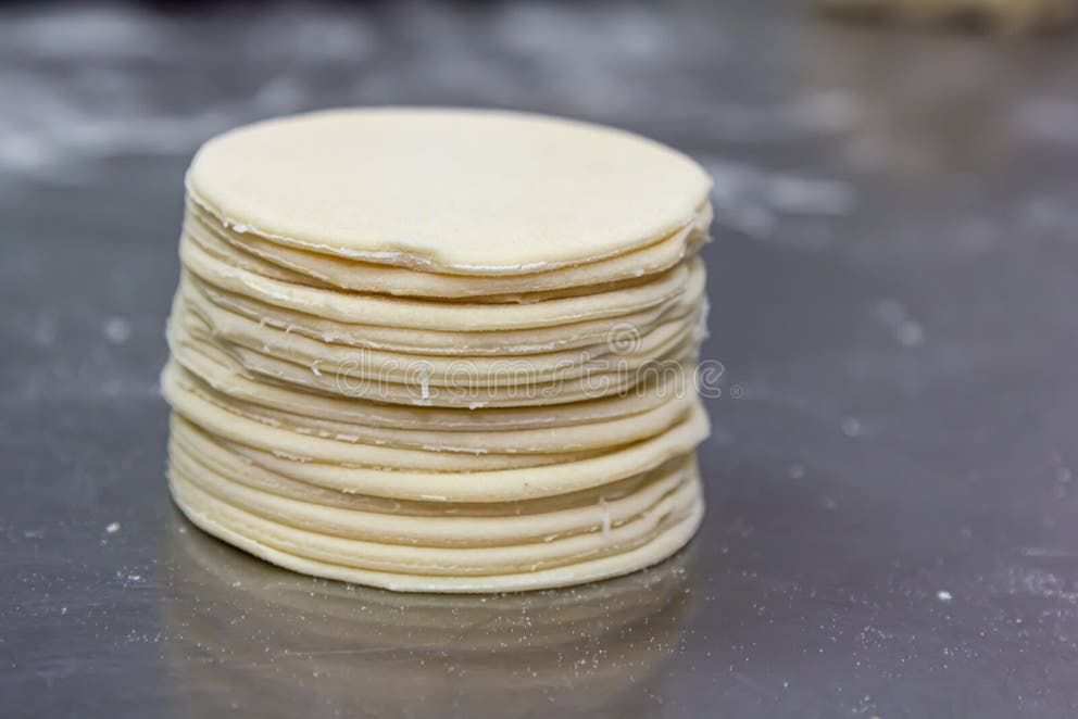 The Dough for Making Dumplings is Stacked on the Table. Stock Image ...