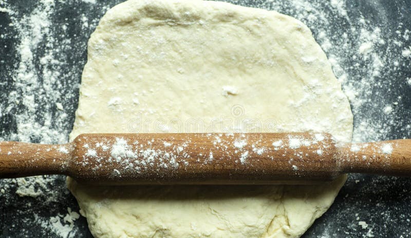 Dough Pizza Background. Cooking Pizza Dough or Bread on the Kitchen ...