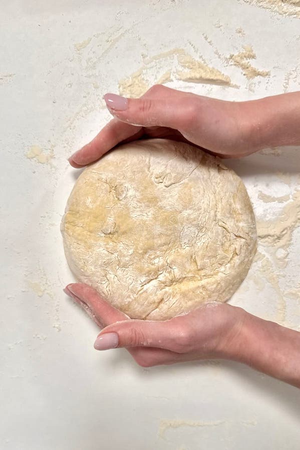 Dough Preparation Process with Hands Kneading Fresh Bread Mixture on a ...