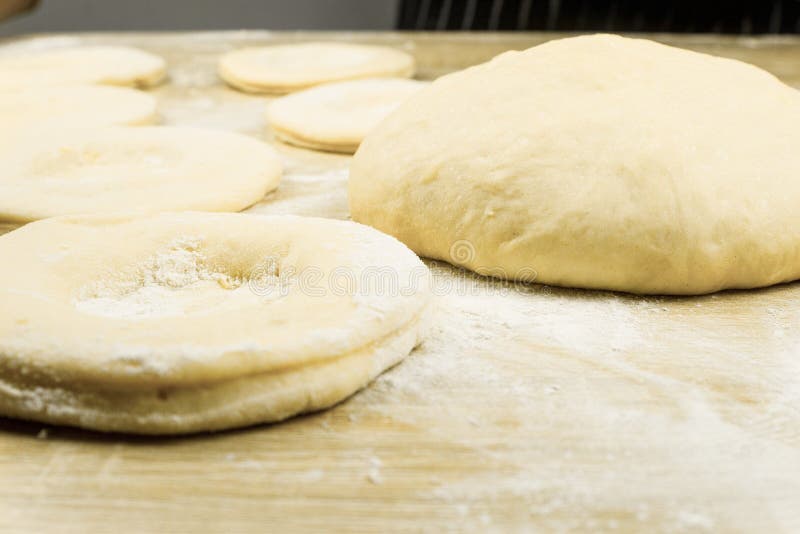 Dough Rolled Out on the Table in the Form of Cakes Stock Photo - Image ...