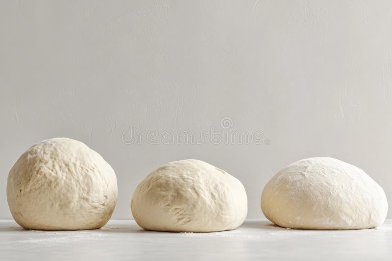 Dough in Various Stages of Preparation on a Neutral Backdrop Stock ...