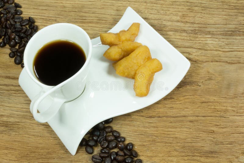 Doughstick and coffee stock image. Image of delicious - 53726357