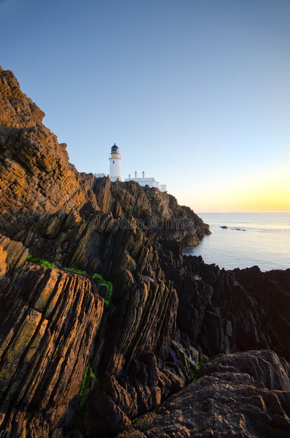 Douglas Lighthouse with Cliffs on Isle of Man Stock Photo - Image of ...