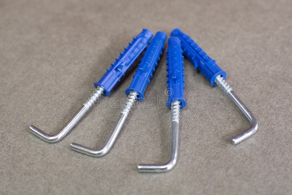Dowel Hook Universal. Conical Two-material Inserts and Split-ribbed Wall Plugs Stock Image ...