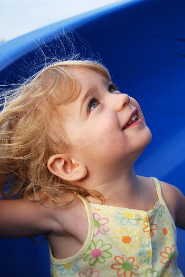 Down the slide stock photo. Image of happy, cute, blond - 5517840